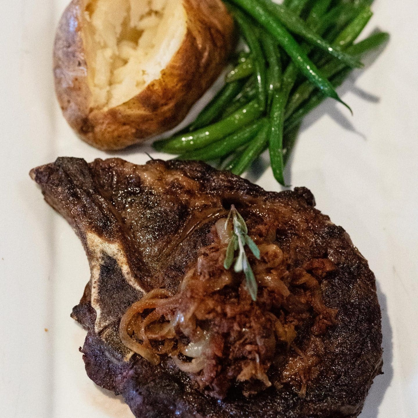 Bone-in Ribeye (gf) - The Feast Restaurant on Anna Maria Island